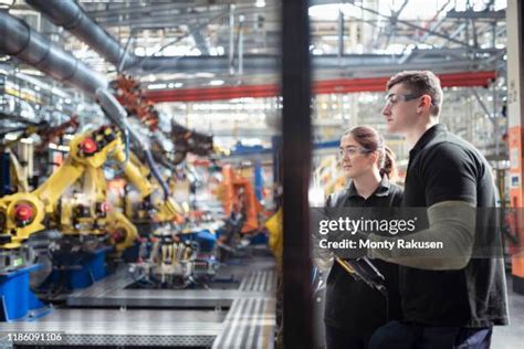 Engineer Assembling Robotics Photos And Premium High Res Pictures