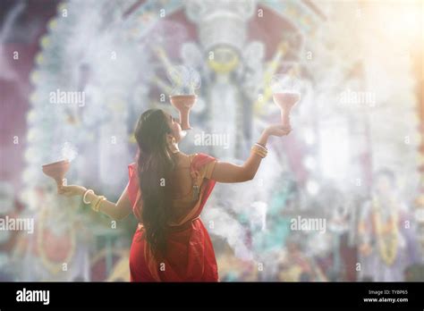 Bengali Women Performing Dhunuchi Dance On The Occasion Of Durga Puja