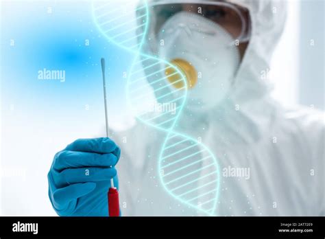 Selective Focus Of Scientist Doing Dna Test And Standing Near