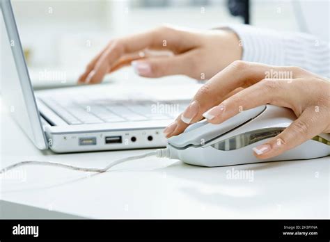 Female Hand Using Computer Mouse Stock Photo Alamy