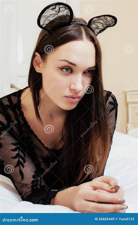 Young Pretty Brunette Woman Wearing Lace Mouse Ears Laying Waiting