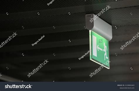 Emergency Exit Sign Against Dark Background Stock Photo Shutterstock