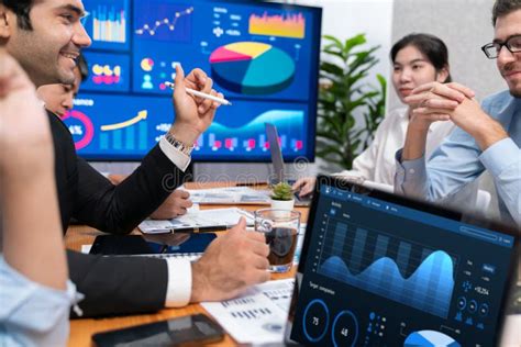 Group Of Business Analyst Team Analyzing Financial Data Report
