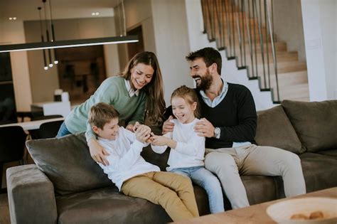Premium Photo Cute Siblings Fighting Over Tv Remote Control At Home
