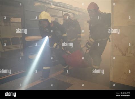 The Concept Of The Rescue Service Rescuers Firefighters Evacuate On A