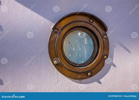 Brass Porthole Ropes Rigging Masts And Stays On Traditional Sailing Ship Royalty Free Stock