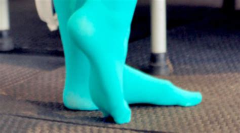 Women`s Legs And Feet In Tights Legs And Feet In Various Color Tights