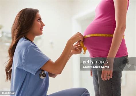 57 Doctor Measuring Pregnant Womans Stomach With Tape Measure Stock
