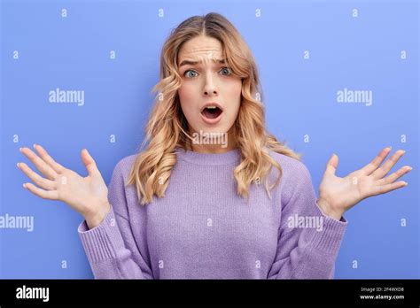 Portrait Of Attractive Woman With Open Mouth Making Crazy Astonished