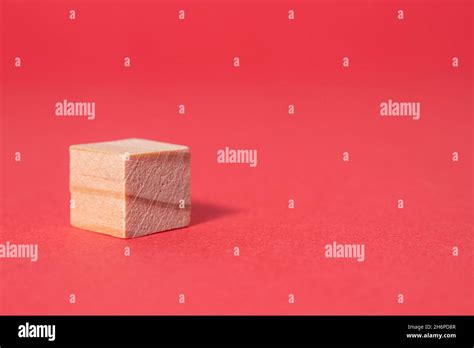 Wooden Cube Without An Icon On A Red Background Stock Photo Alamy