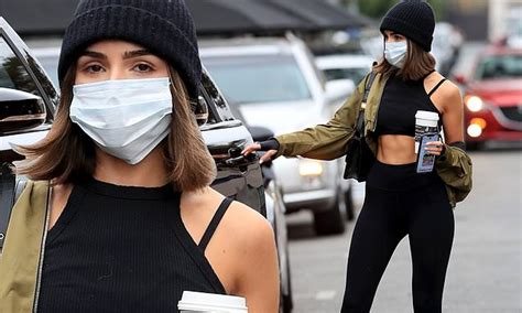 Olivia Culpo Shows Off Her Incredibly Toned Abs In A Crop Top As She