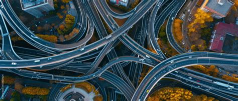 Urban Complexity An Aerial View Of Intertwined Highways A Testament To Modern Infrastructure