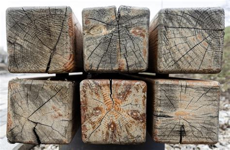 Premium Photo A Stack Of Wooden Posts With The Word Wood On It