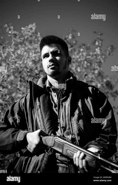 Poacher With Rifle Spotting Some Deers Illegal Hunting Poacher In The