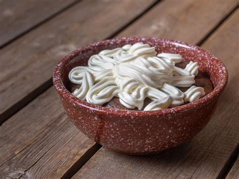 Premium Photo Bread Soup With Whipped Cream In A Deep Clay Cup On An
