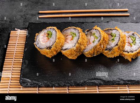 Baked Sushi Rolls With Tuna Stock Photo Alamy