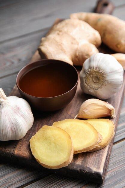 Premium Photo Fresh Garlic And Other Natural Cold Remedies On Light
