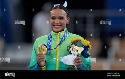 Rebeca Andrade Of Brazil Poses After Winning The Gold Medal For The