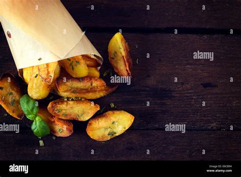 Potatoes From Above On The Wooden Tabvle With Blank Space On Right Side