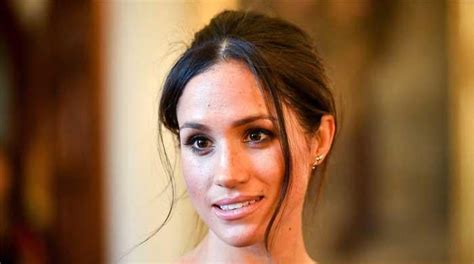 Russell Brand Says He Kissed Meghan Markle