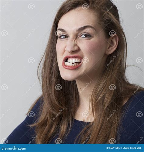 Angry Beautiful 20s Girl Grinding Her Teeth Threatening Stock Image