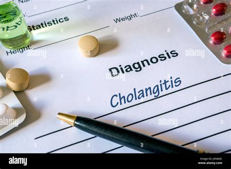Diagnosis Cholangitis Written In The Diagnostic Form And Pills Stock