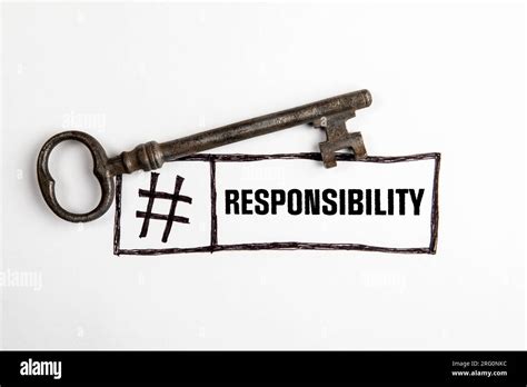 Responsibility Concept Door Key And Text On A White Background Stock