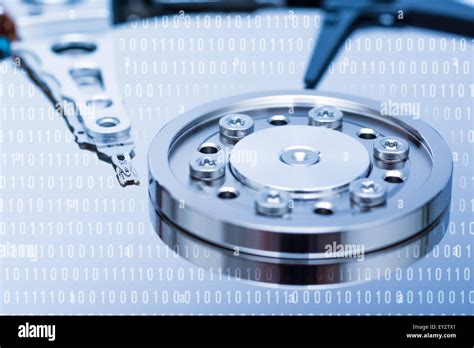 Computer Hard Disk Drive Internals And Binary Number Code Stock Photo Alamy