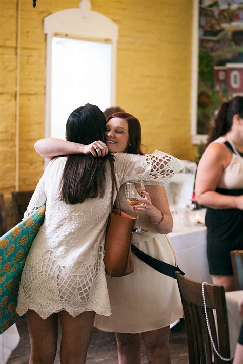 Shower Friends Embrace At Bridal Party By Stocksy Contributor Sean