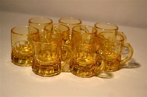 9 Vtg Federal Glass Mini Beer Mug Shot Glasses Yellow Amber Carnival