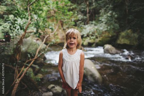 Cute Young Girl Having To Go Pee Outside Near River Stock Foto Adobe