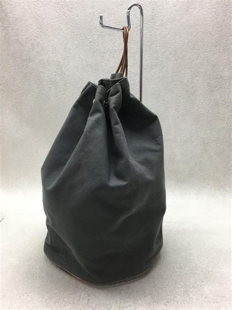 Hermesエルメス マトロマルセルコットンgryマテロット巾着 中古品の販売・通販ならセカンドストリート