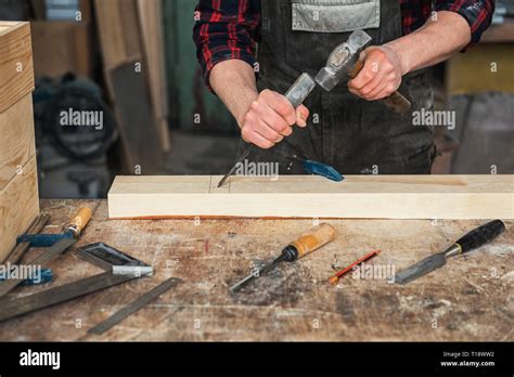 Carpenter Working With A Chisel Stock Photo Alamy