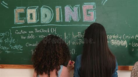 Back View Of Smart Student Writing Coding Engineering Prompt At Board