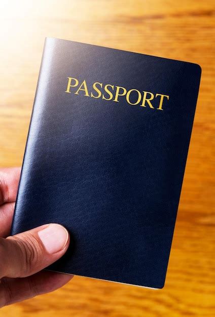 Premium Photo Hand With Blank Passport
