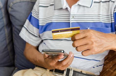 Man Using Credit Card To Shop Online Stock Photo At Vecteezy
