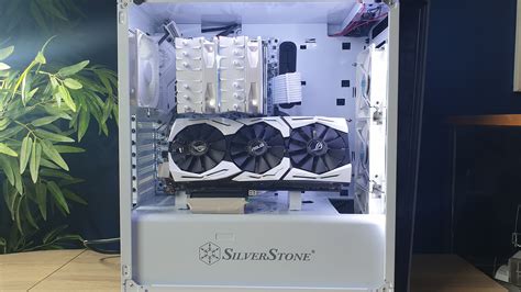 This White Gaming Pc Has A Graphics Card Mount Made From Coat Hooks