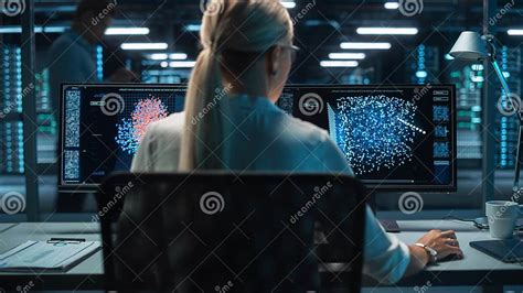 Portrait Of Female Technical Operator Works With Display Showing Neural