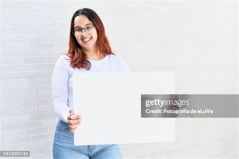 Girls Holding Signs Photos And Premium High Res Pictures Getty Images