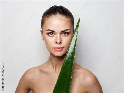 Nude Woman Clean Skin Cosmetology And Green Aloe Leaf Stock Photo Adobe Stock
