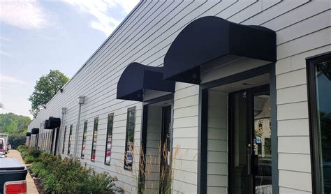 Doorhood Awnings On A Business Center Kreiders Canvas Service Inc