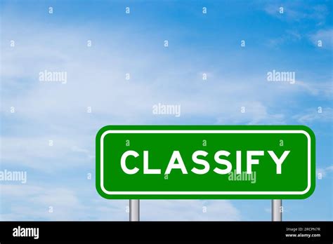 Green Color Transportation Sign With Word Classify On Blue Sky With