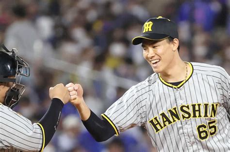 〈大ブレークの原点〉「あの伝説のスライダーも！」阪神・湯浅京己の運命を変えた伊藤智仁の“魔法の引き出し” プロ野球 Number