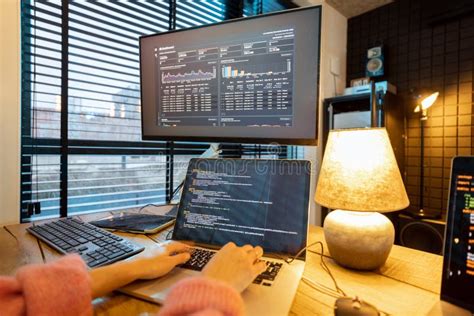 Female Programmer Writing Programming Code At Cozy Home Workplace Stock