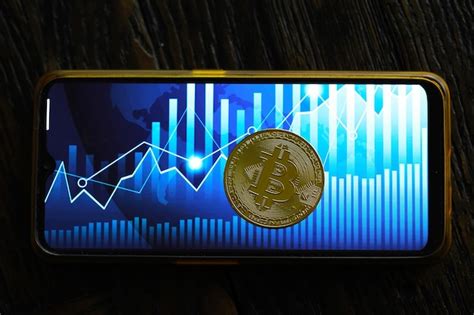 Premium Photo Bitcoin Gold Coin And Defocused Chart Background