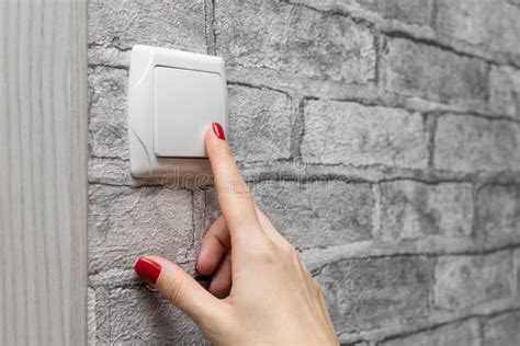 Female Hand Presses The Switch Button In The Room Stock Image Image Of Hand Button 269049273