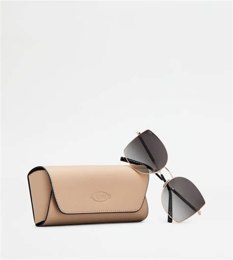 Woman Gold Sunglasses With Temples In Leather Xow03675719agupzb601 Tods