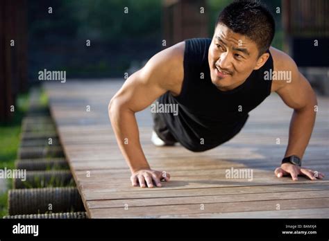 Man Doing Push Ups Stock Photo Alamy