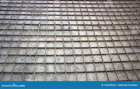 A Grid Of Reinforcement Laid On The Surface Ready For Pouring Concrete