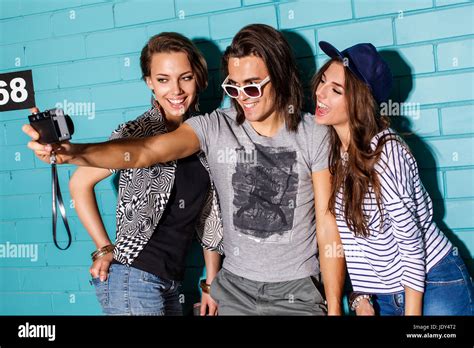Lifestyle Portrait Of Beautiful Best Friend Hipsters Wearing Stylish